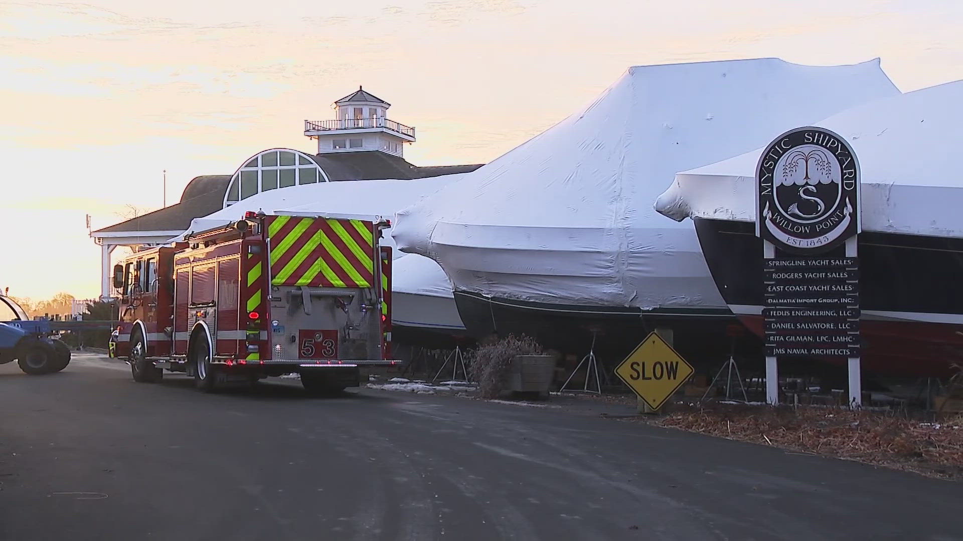 Officials are assessing damage after overnight fire at Mystic Shipyard ...