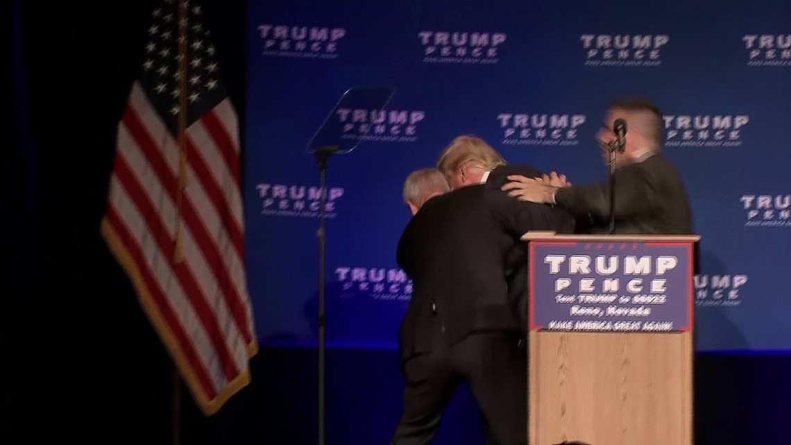 Trump rushed off stage at campaign rally; protester says he was roughed ...