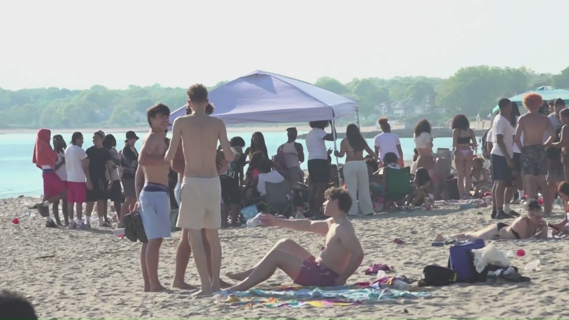 Hammonasset Beach State Park visitors enjoy the hot weather and have ...