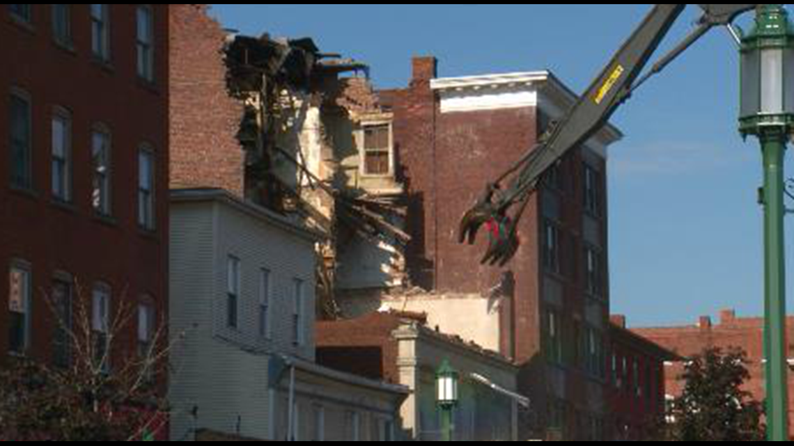 Demolition crews tear down partially collapsed building in Hartford ...