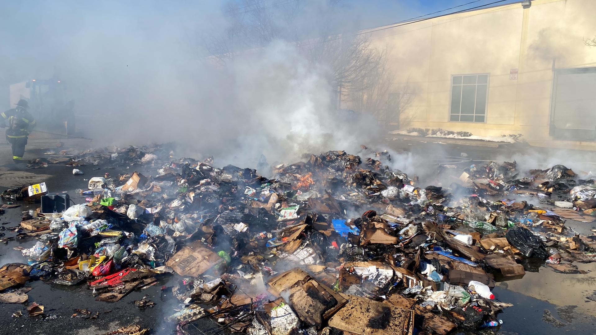 Waste Management trash truck in Norwalk catches fire | fox61.com