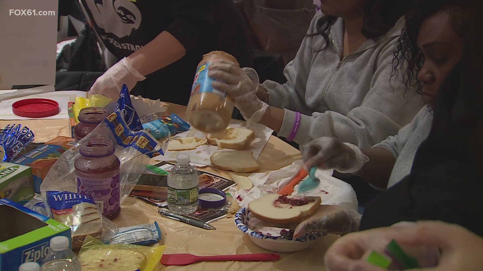 Connecticut volunteers make over 2,026 PB&J sandwiches for those in ...