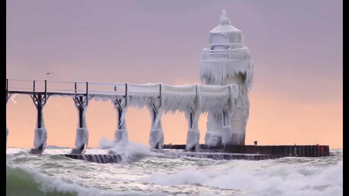 Frozen Michigan lighthouse looks out of this world in drone video ...