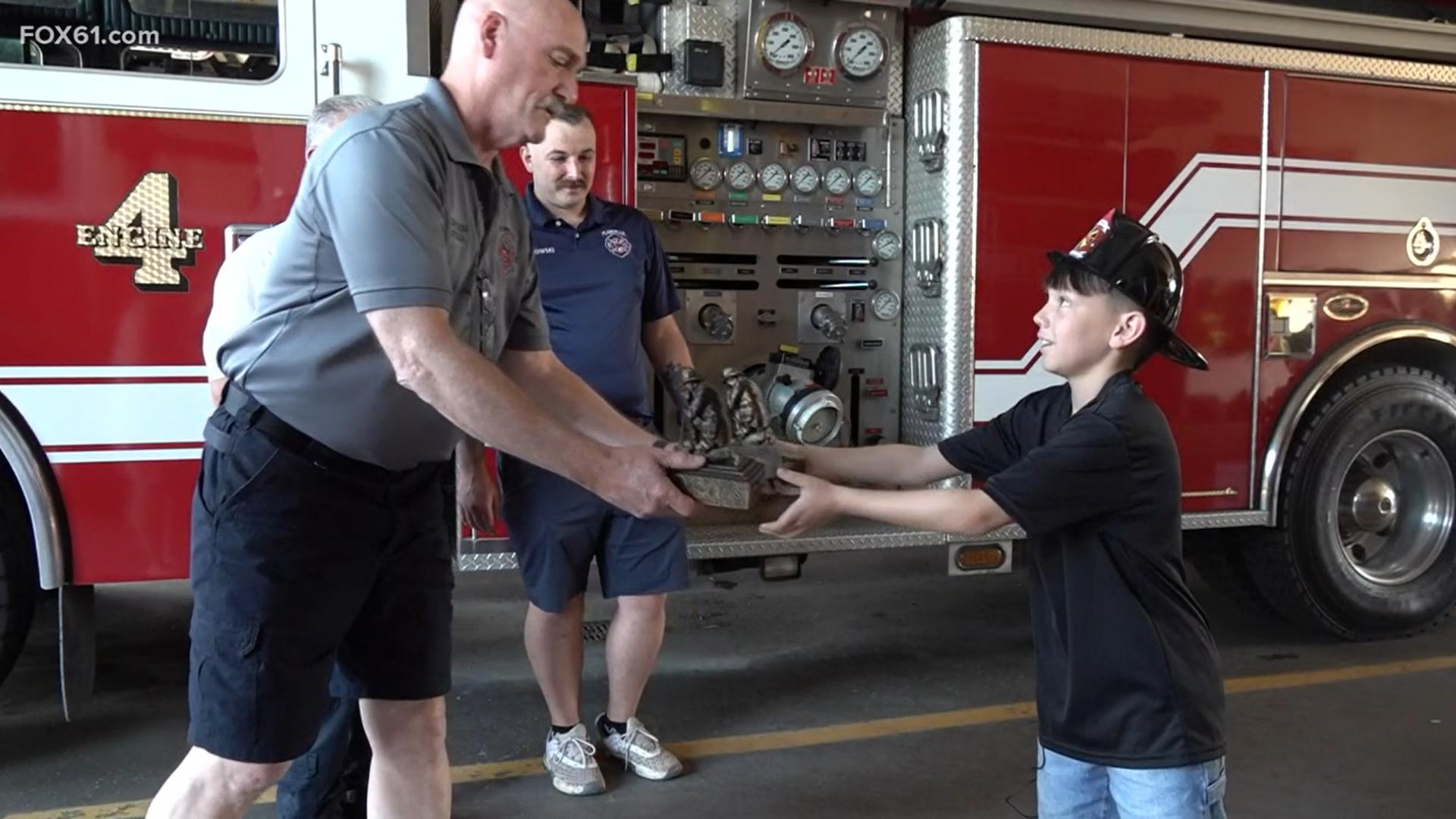 10-year-old honors fallen Plainville firefighter Ray Moreau with ...