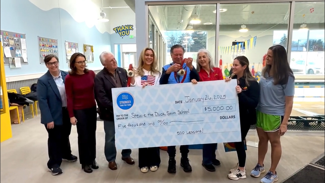 Ali Truwit presents $5K donation to swim school nonprofit | fox61.com