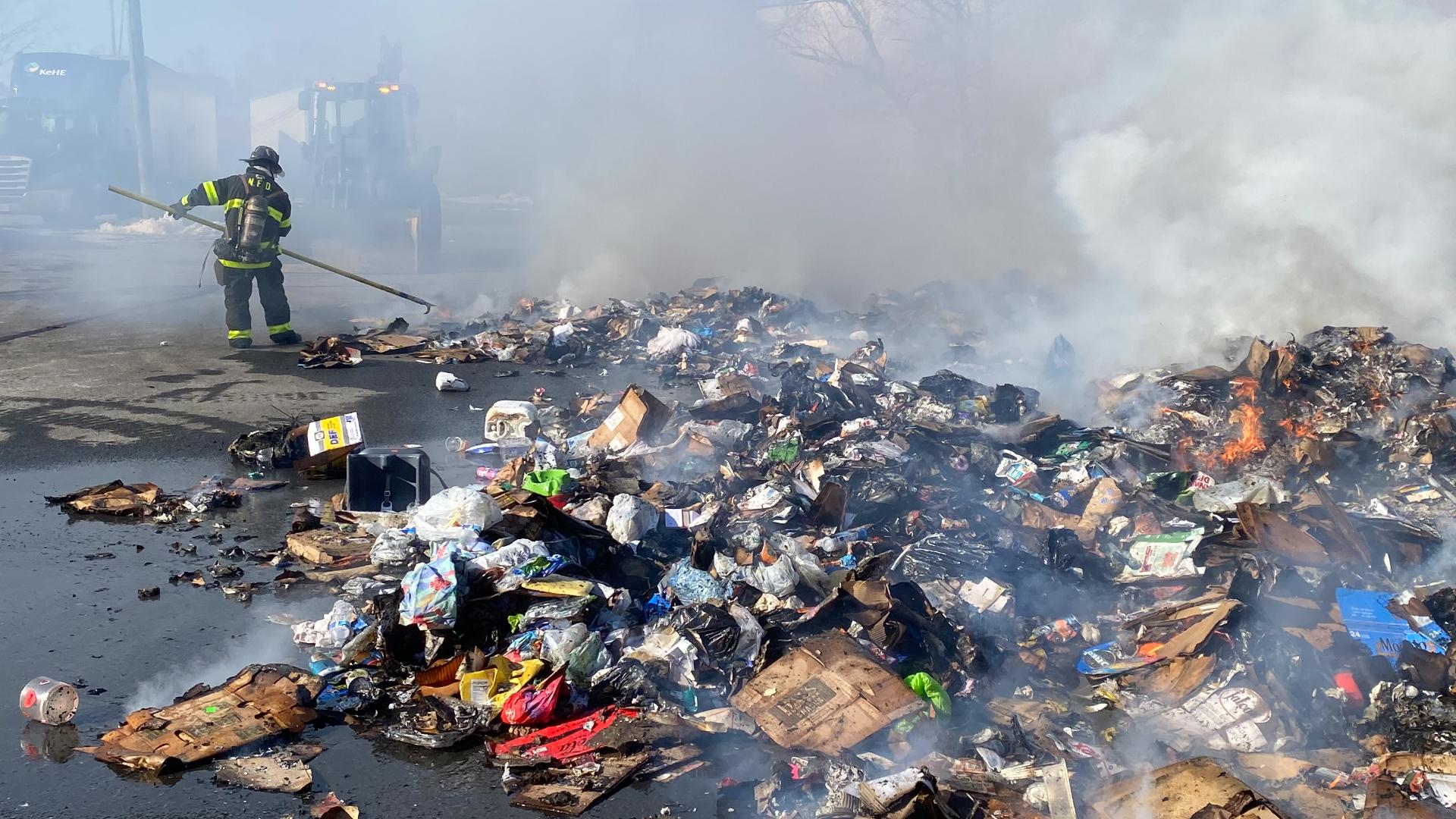 Waste Management trash truck in Norwalk catches fire | fox61.com