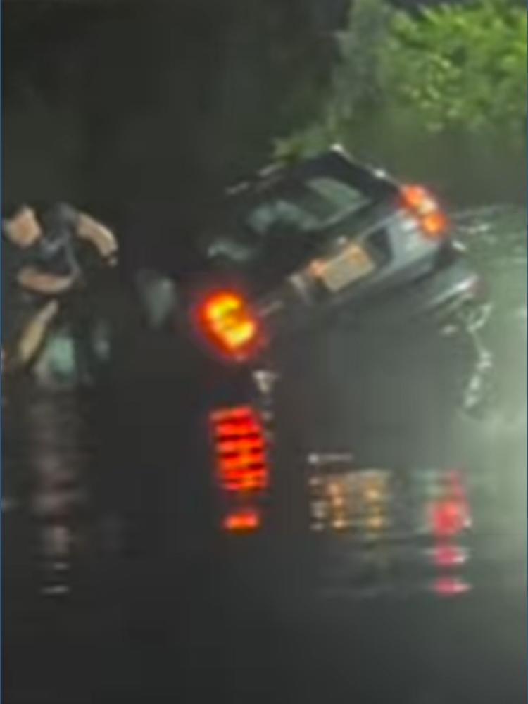 Milford, Conn. police rescue driver from pond before car goes ...