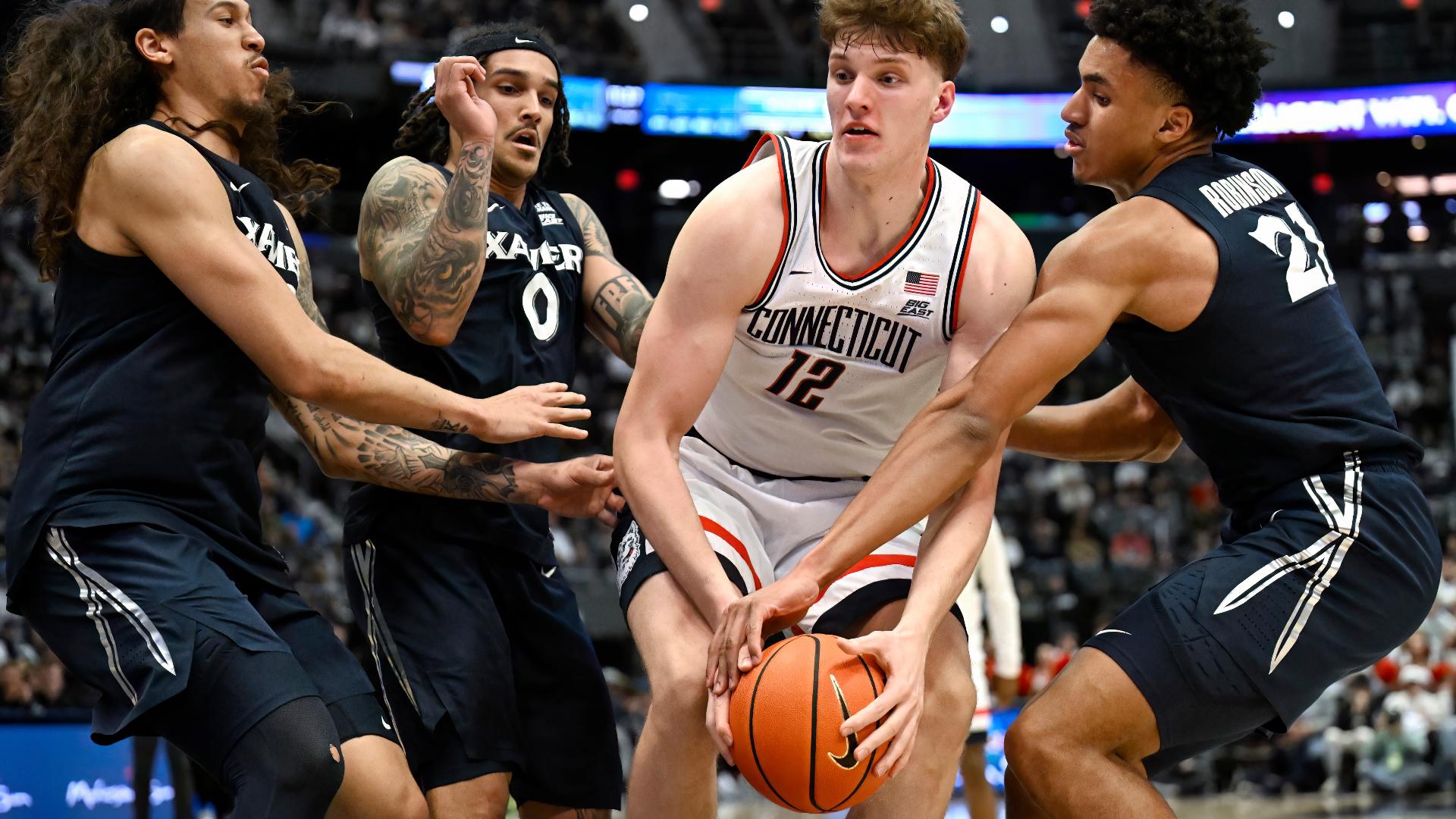 UConn men’s basketball center Eric Reibe enters transfer portal after ...