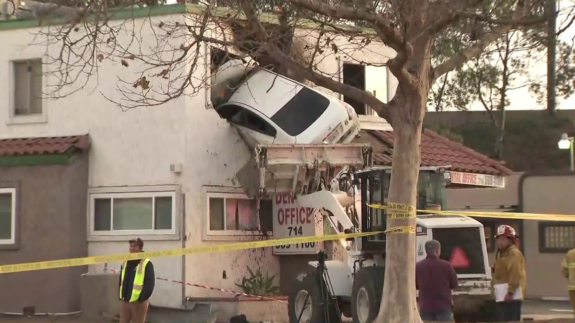 WATCH: Car flies into second floor of building and gets stuck | fox61.com