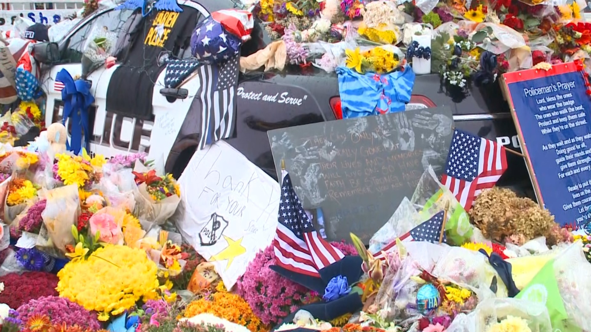 Memorial for fallen Bristol police officers continues to grow | fox61.com