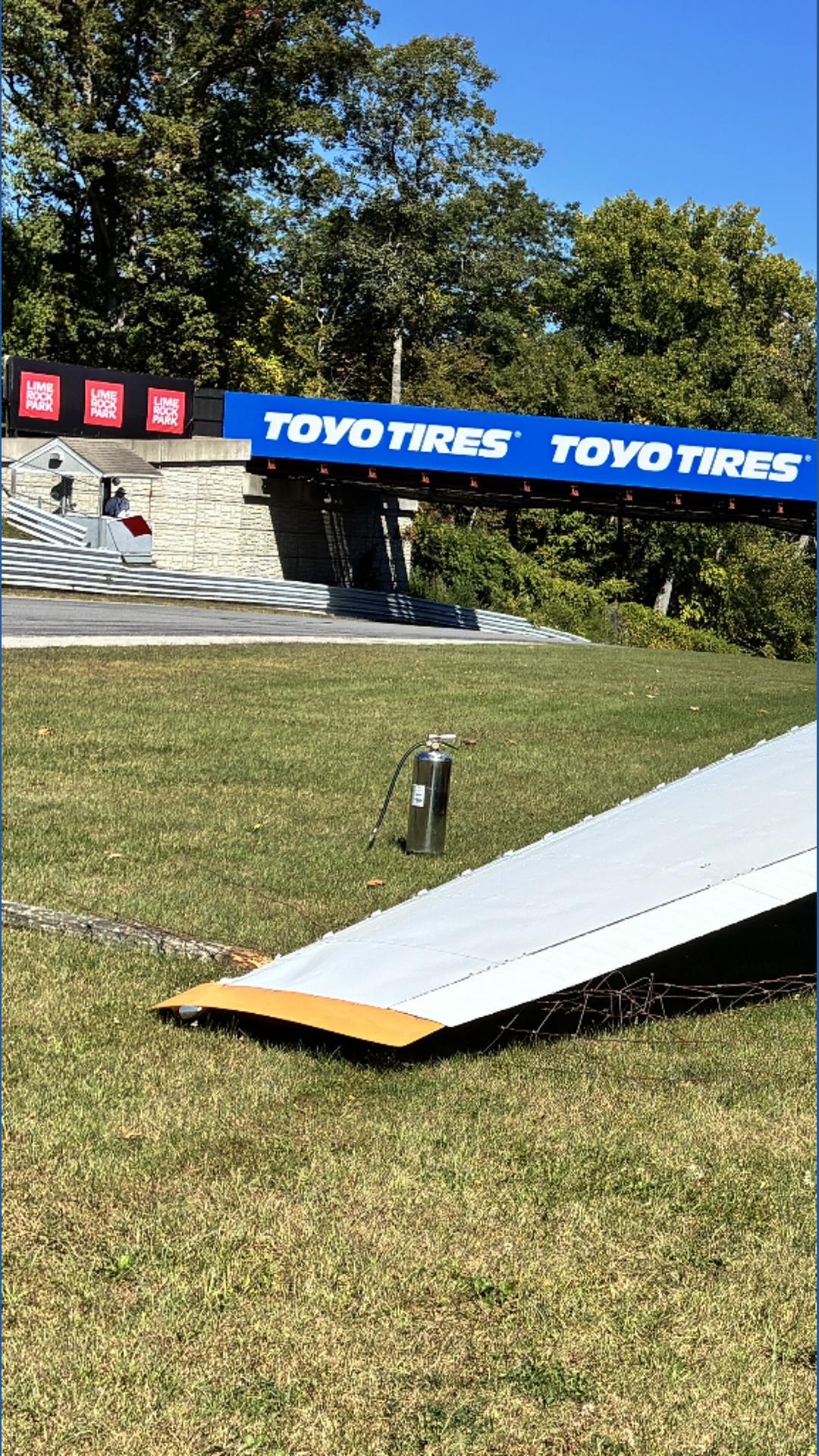 Small plane crash lands at Connecticut's Lime Rock Park racetrack ...