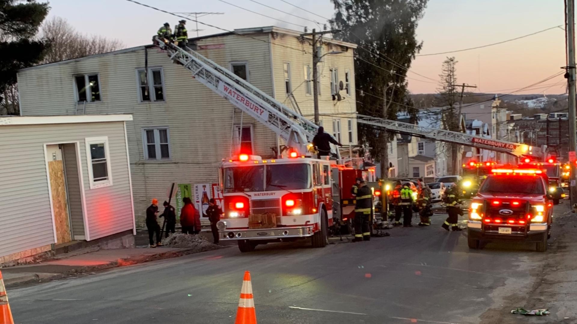 Crews tackle blaze at multi-family home in Waterbury | fox61.com