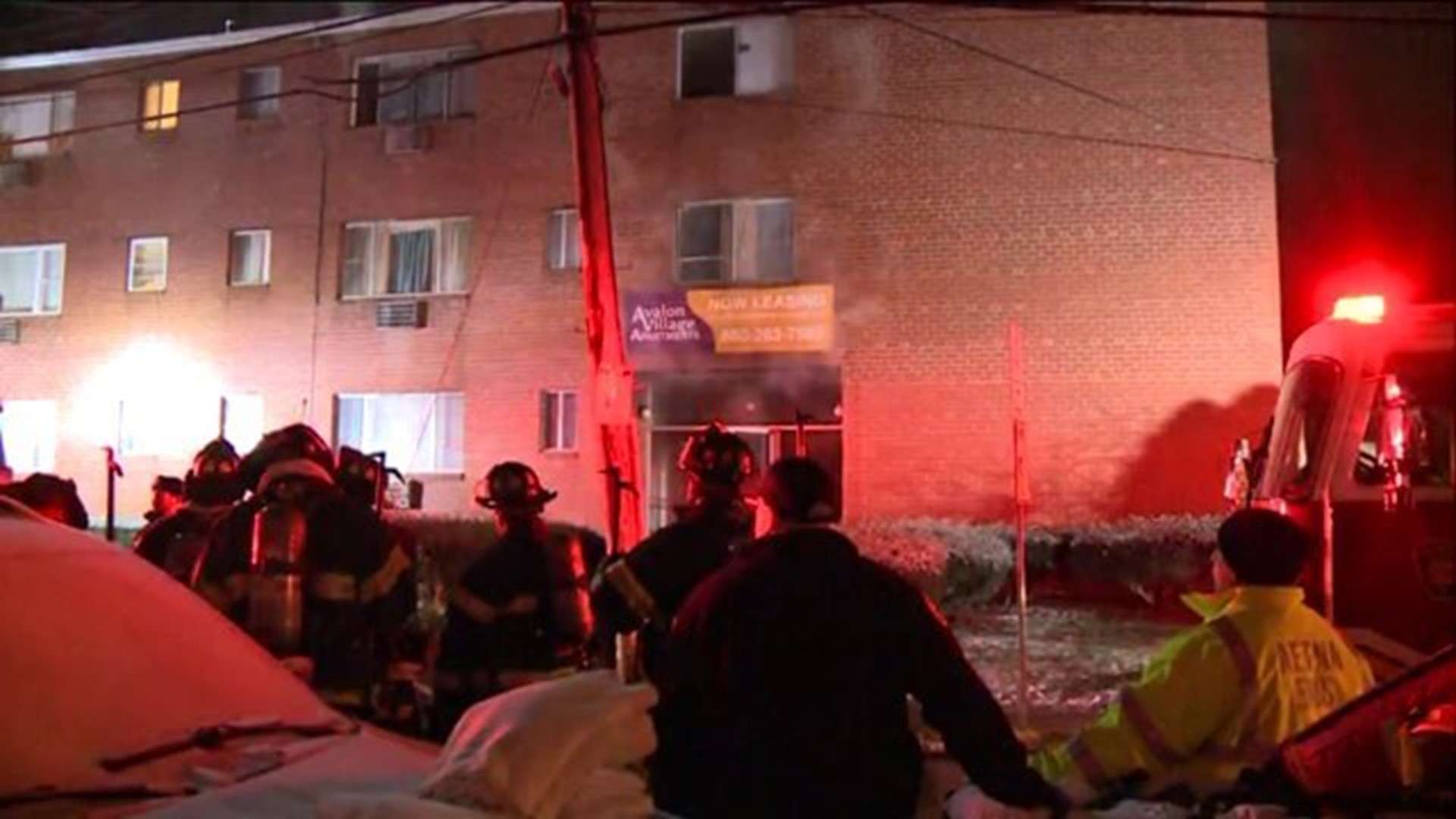 Hartford firefighters rescue people from building fire, dozens of ...