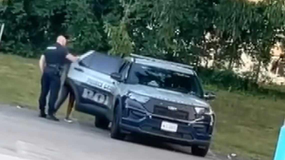 Viral video shows cop getting into backseat of car with woman | fox43.com