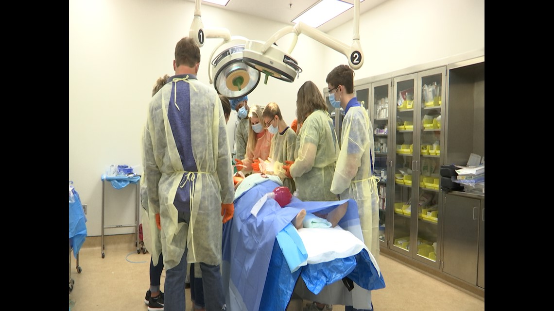 High School students gain hands-on experience with cadavers ...