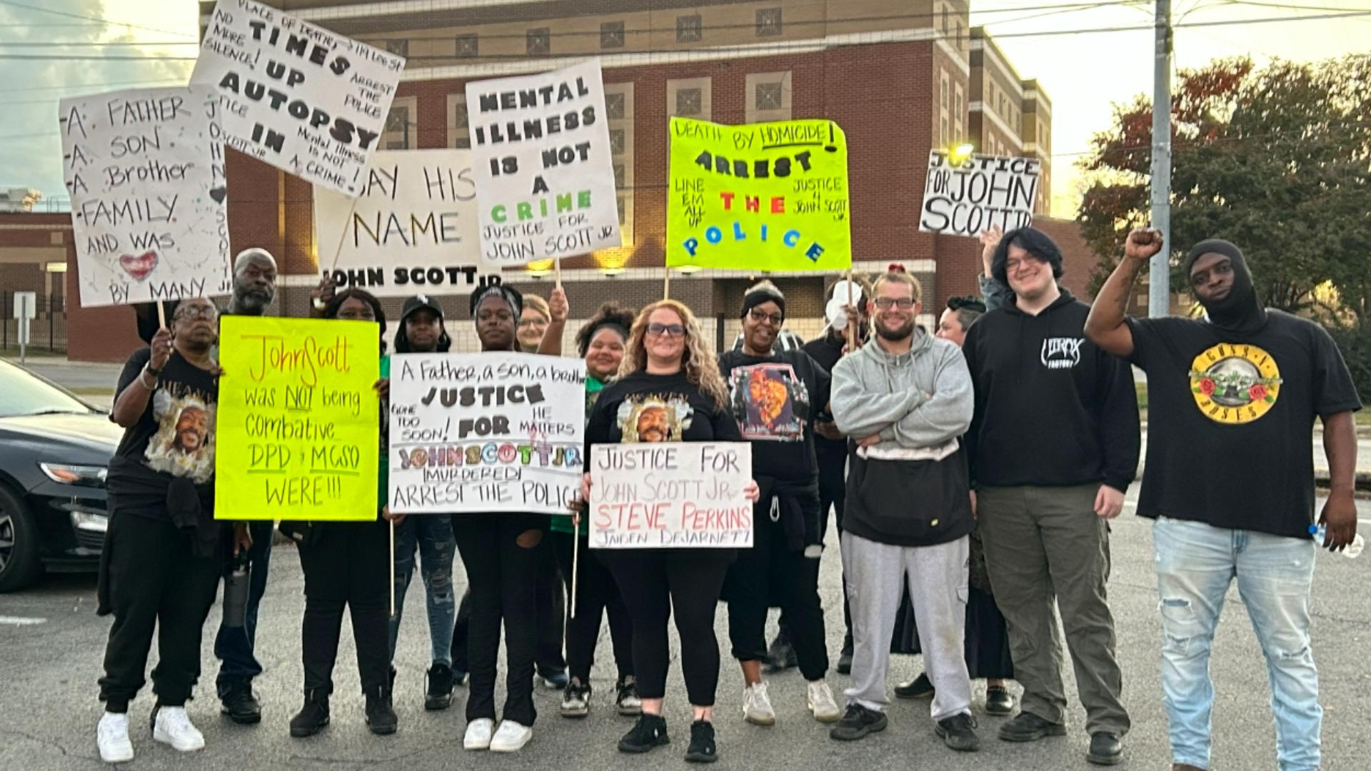 Family of John Scott Jr. holds awareness walk, demands justice months ...