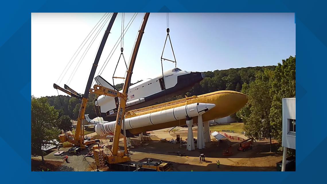 'Pathfinder' hoisted back into place at U.S. Space & Rocket Center ...